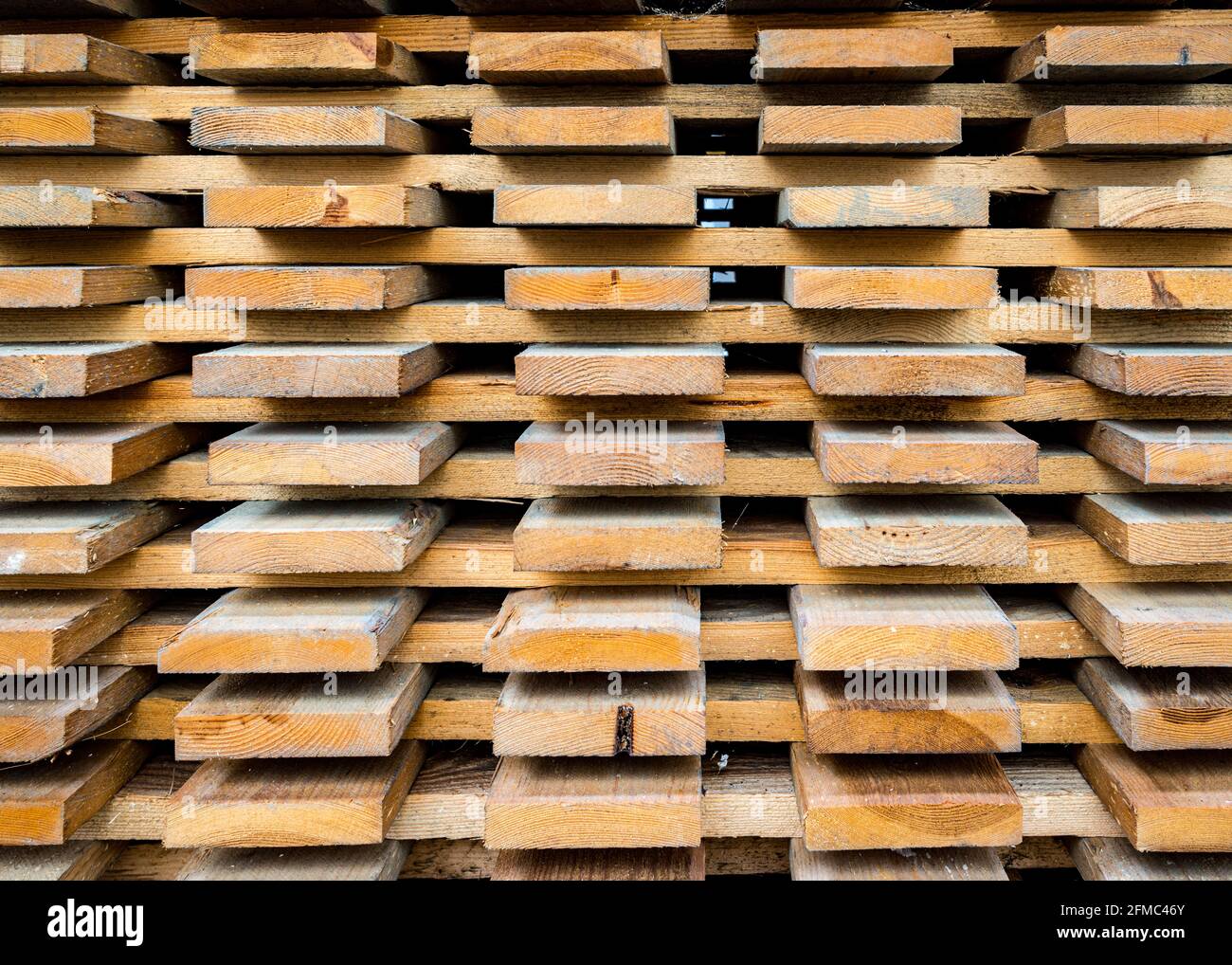 Stacked timber or lumber Stock Photo - Alamy