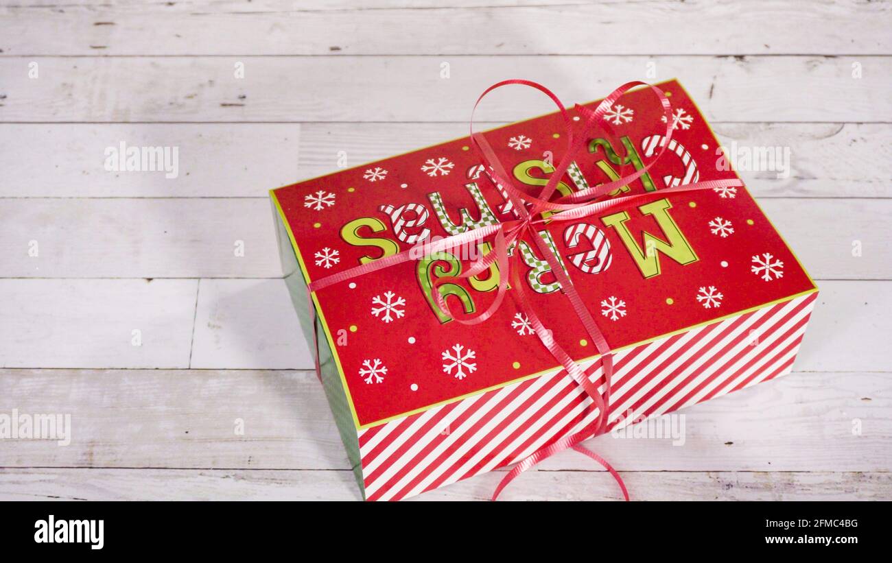 Step by step. Packaging homemade fudge and cookies into a Christmas ...