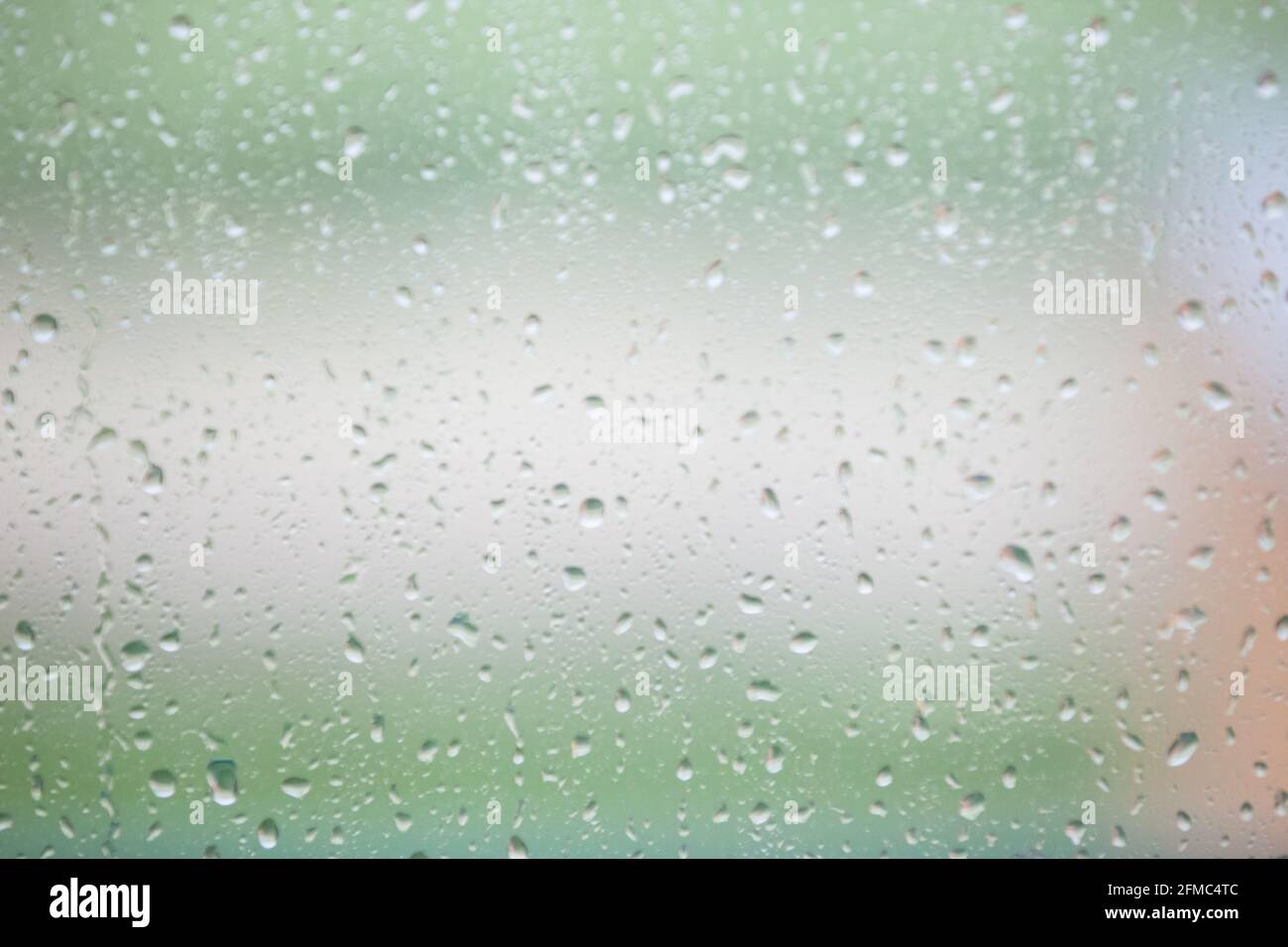 spring raindrops on glass as background Stock Photo - Alamy