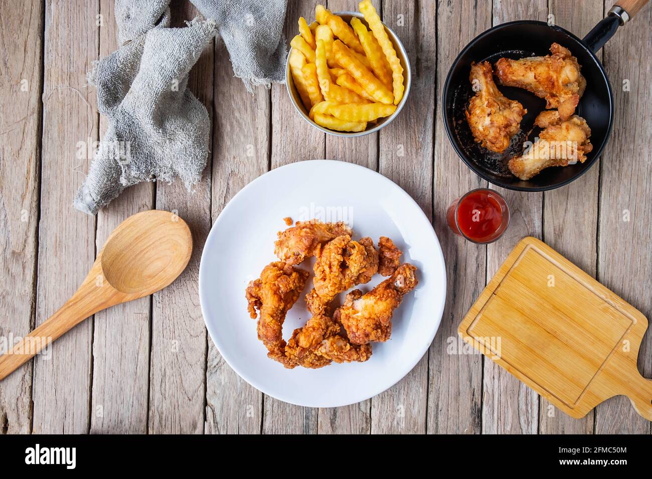 Cook fried chicken on the table in the kitchen Stock Photo - Alamy