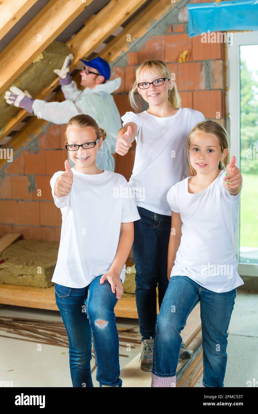 Engineer or father with daughters or daughter with friends building the ...
