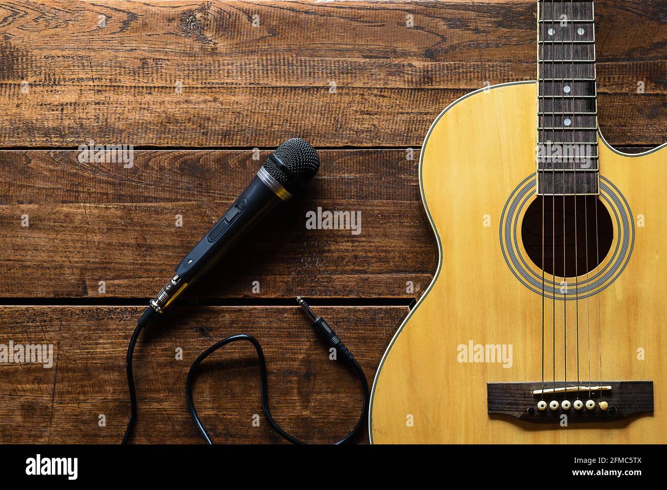 Classical guitar and microphone For musicians Stock Photo - Alamy
