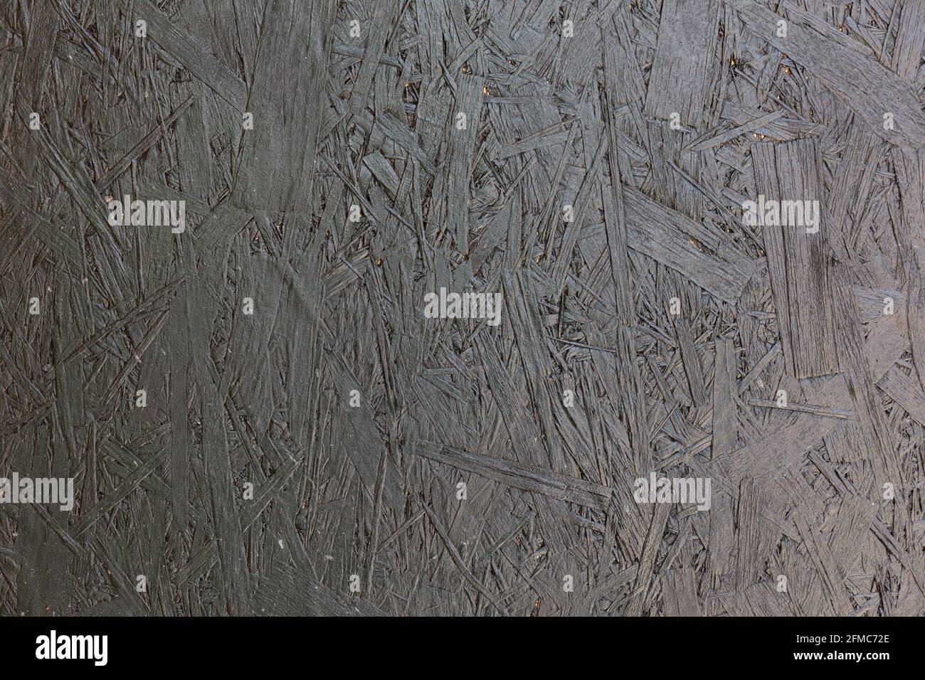 dark gray painted OSB - Oriented strand board - board surface full ...