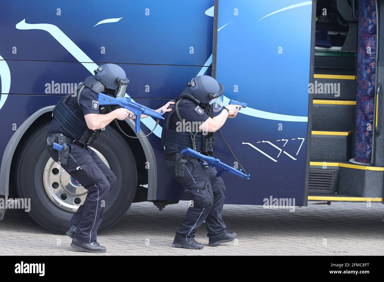 Weimar, Germany. 08th May, 2021. Police officers with helmets and ...