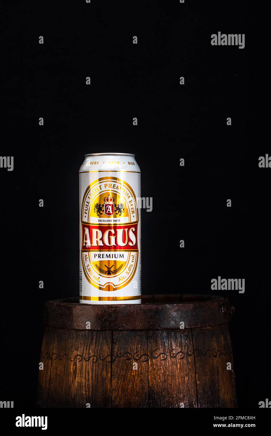 Can of Argus beer on beer barrel with dark background. Illustrative ...