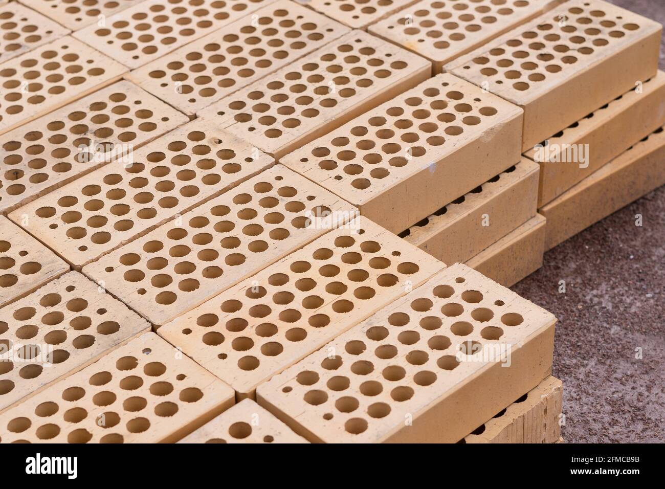 Coffee colored hollow brick construction warehouse close up top view ...