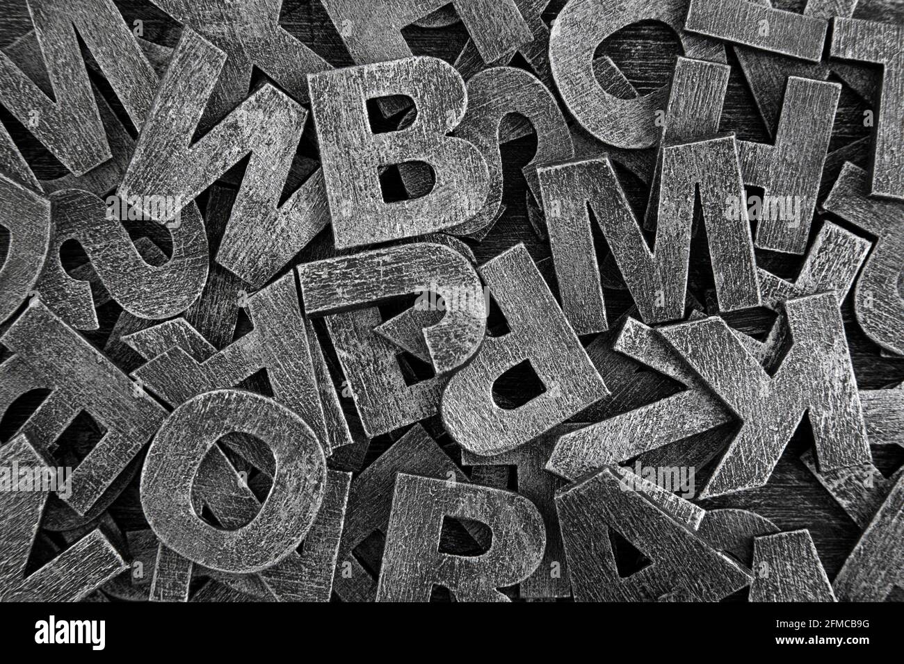 Pile of old vintage wooden letters. Typography background composition ...