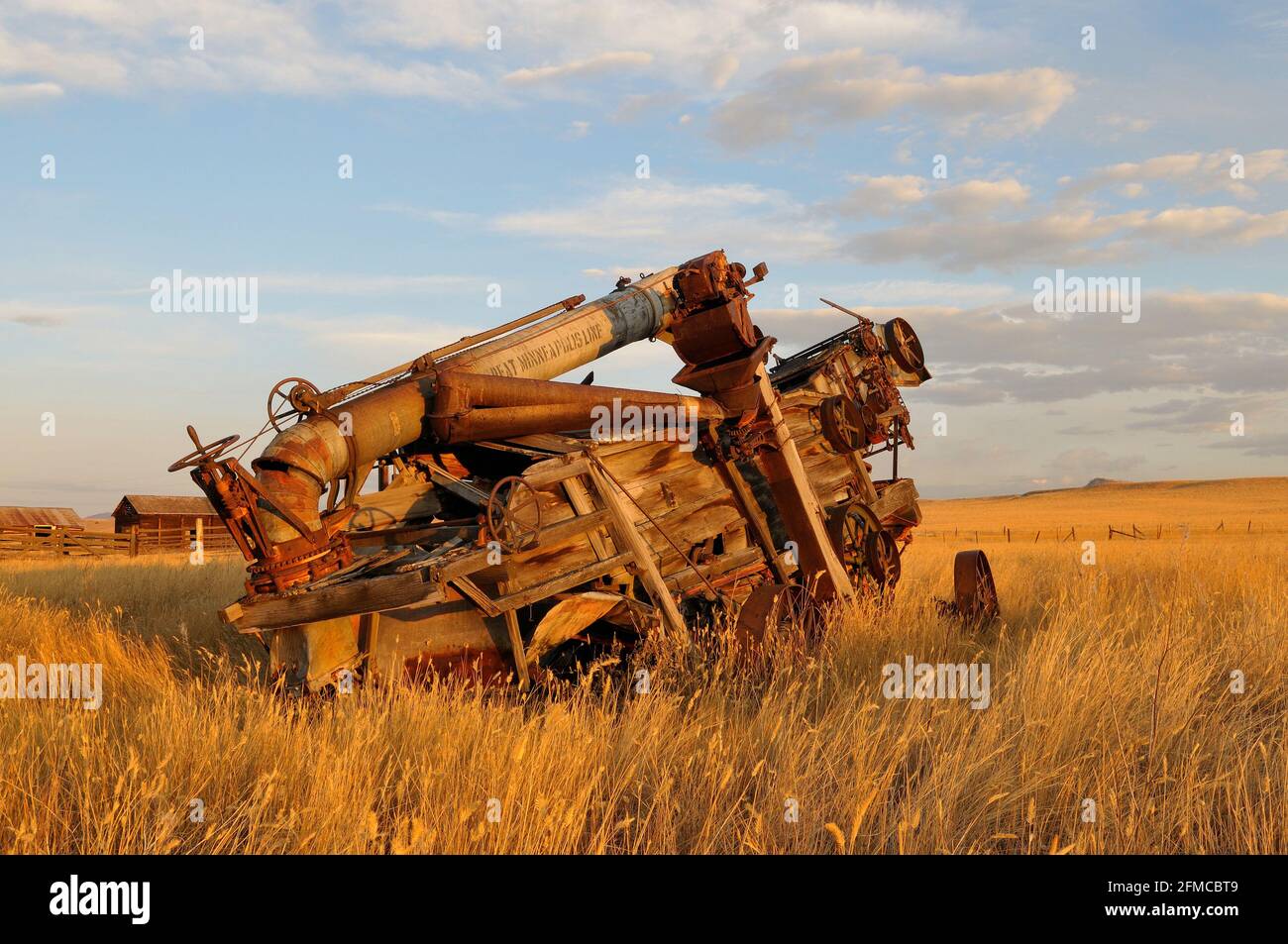 Deserted combine on prairie Stock Photo - Alamy