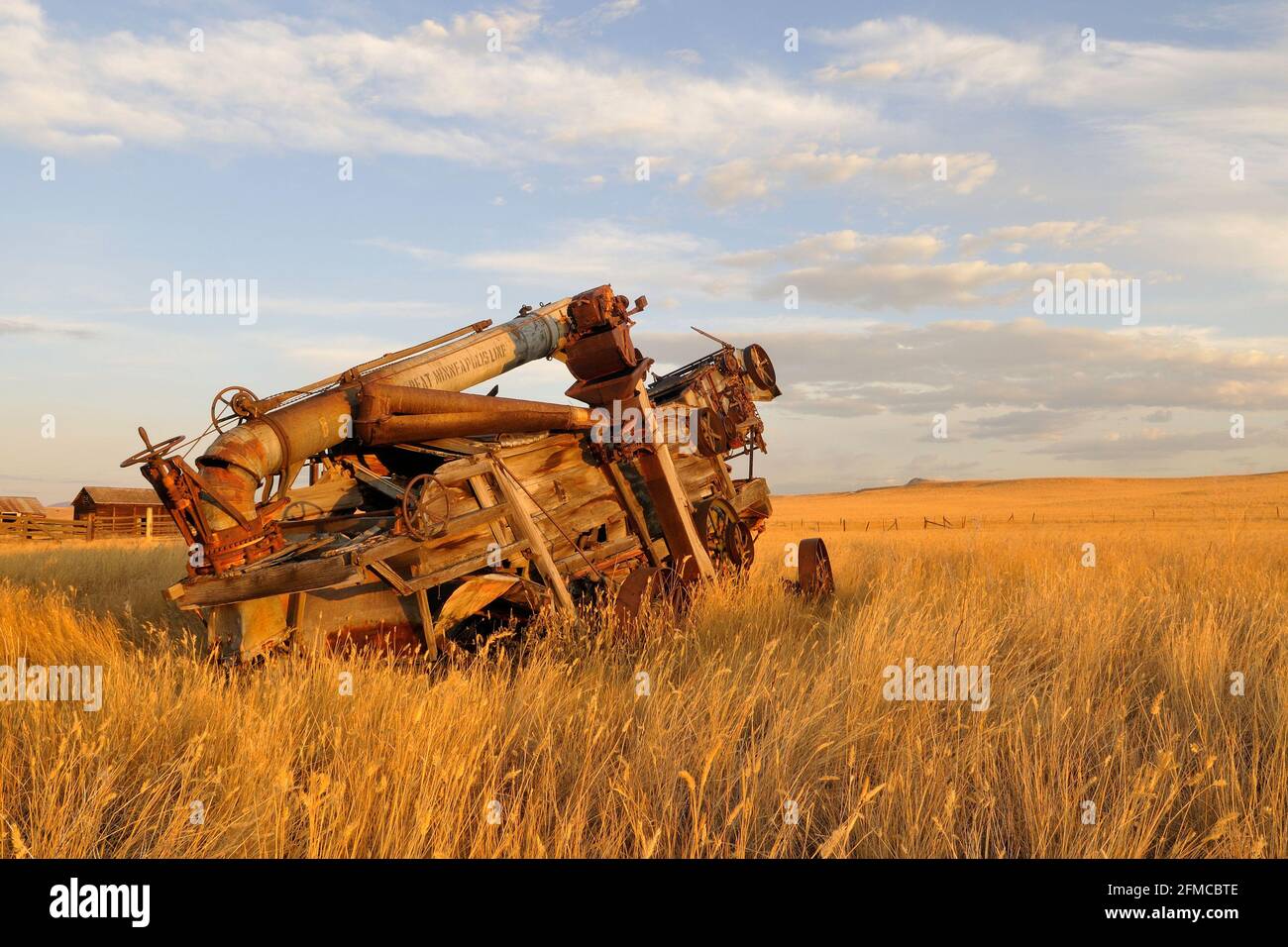 Deserted combine on prairie Stock Photo - Alamy