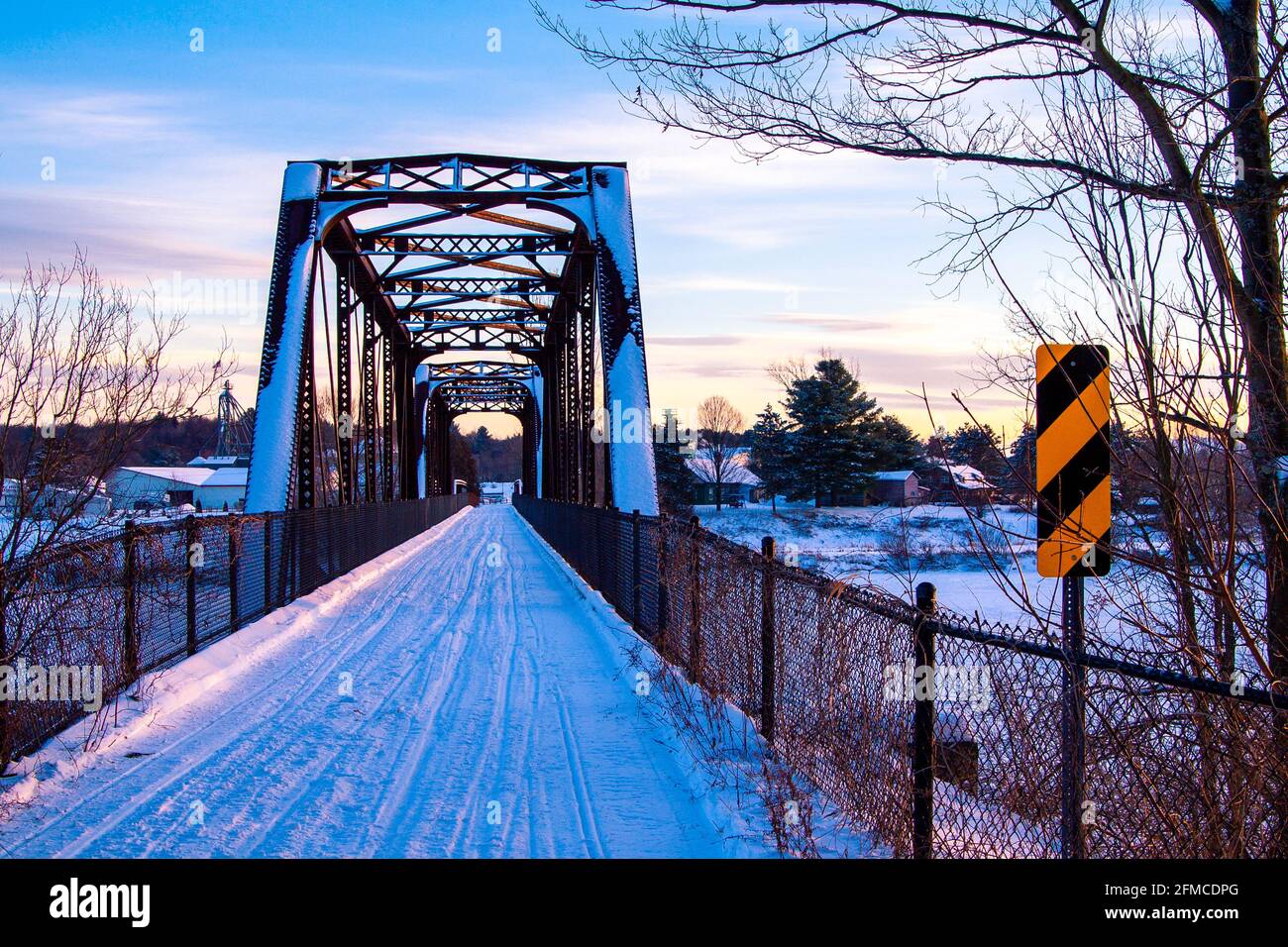 Snow covered bridge at sunset in Vermont Stock Photo - Alamy