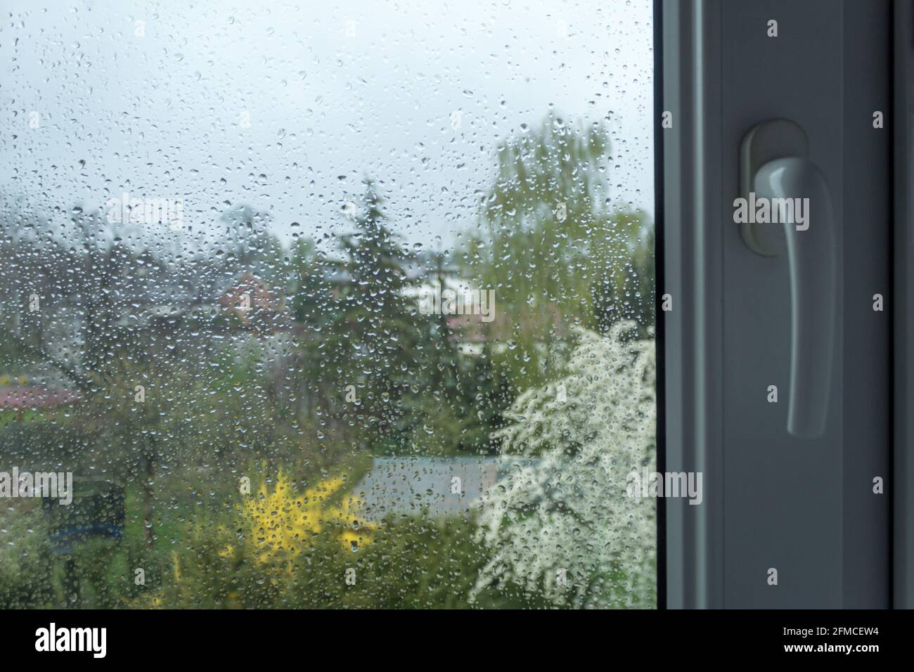 View from house window of rain hi-res stock photography and images - Alamy