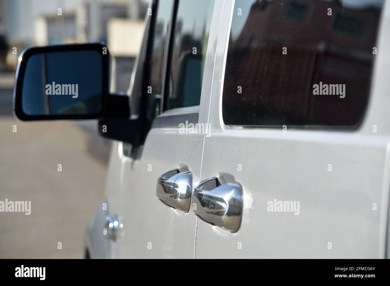Modern car automobile side view mirror and doors Stock Photo - Alamy