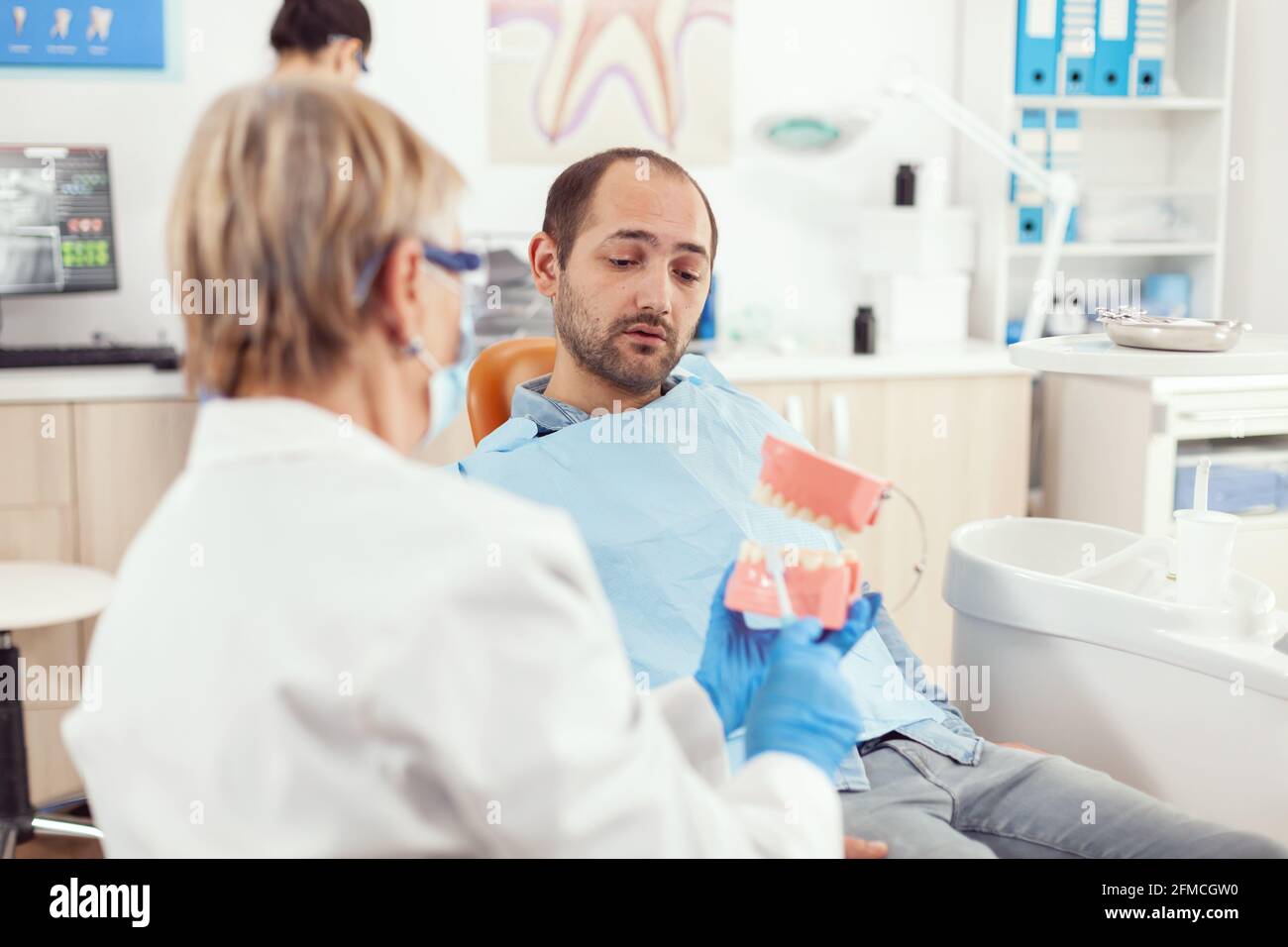 Stomatologist holding plaster model hi-res stock photography and images ...