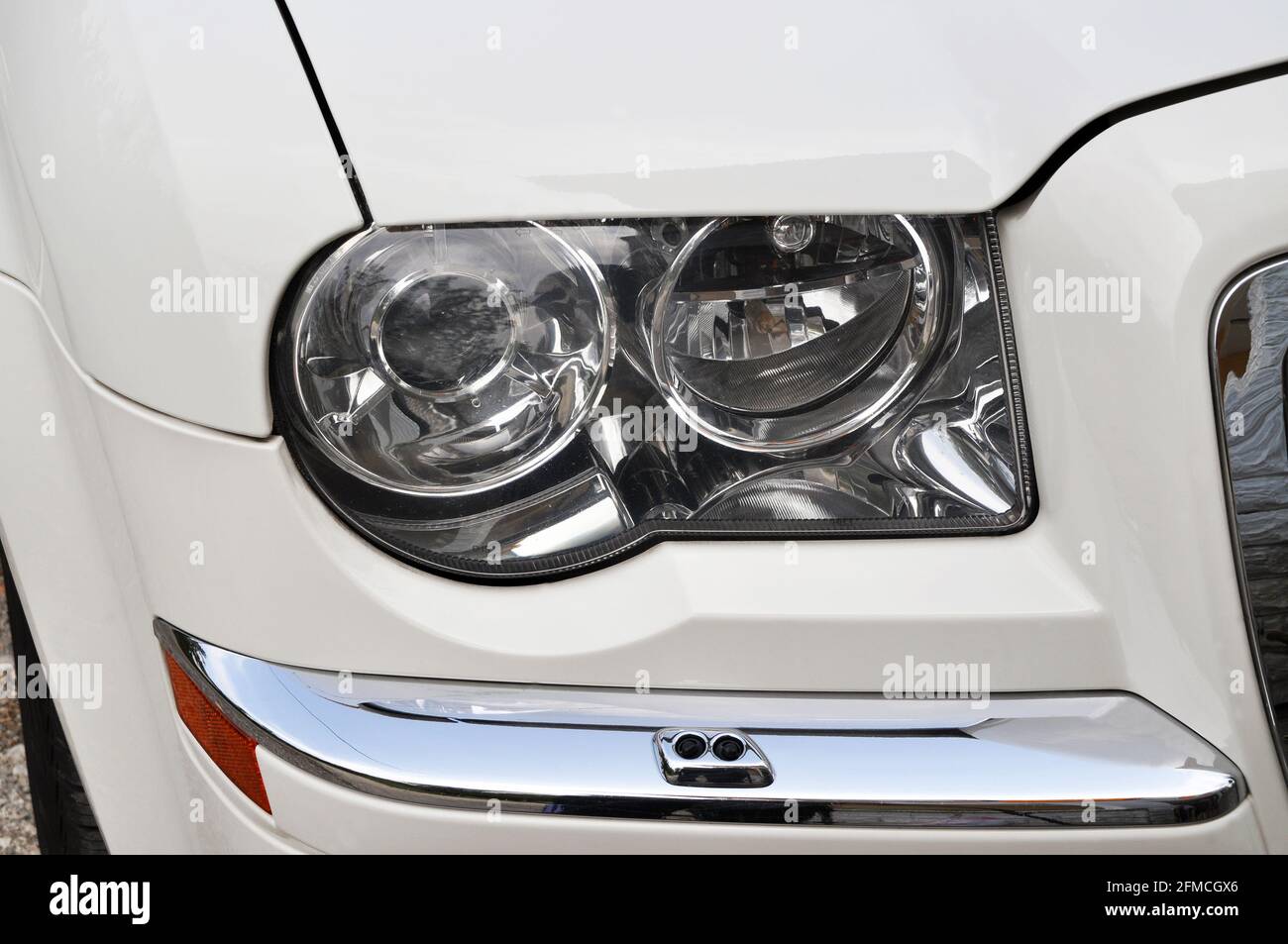 Detail of car headlights lamp, white modern a luxury car front lamp ...