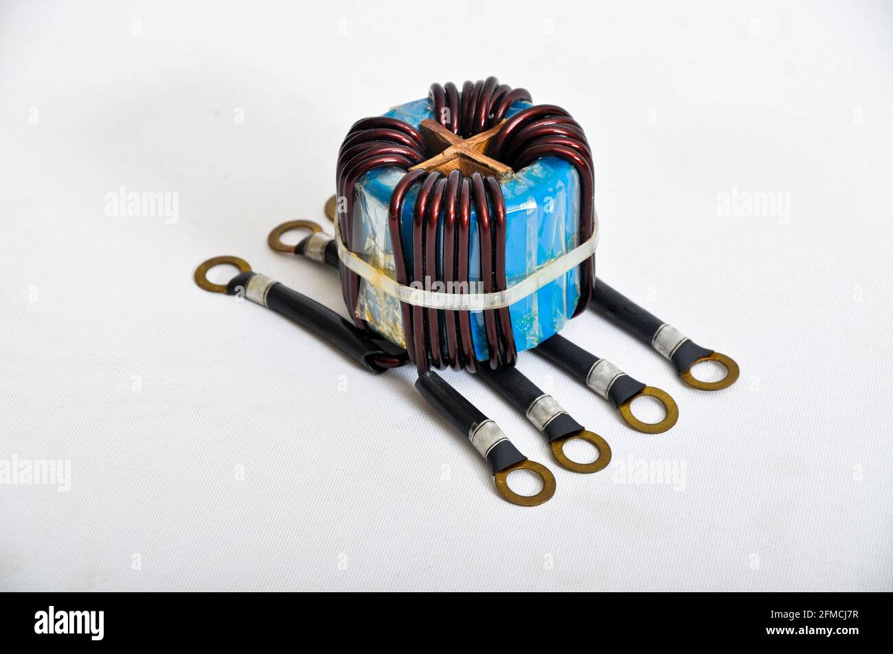 Transformer copper wire coil isolated on a white background Stock Photo ...