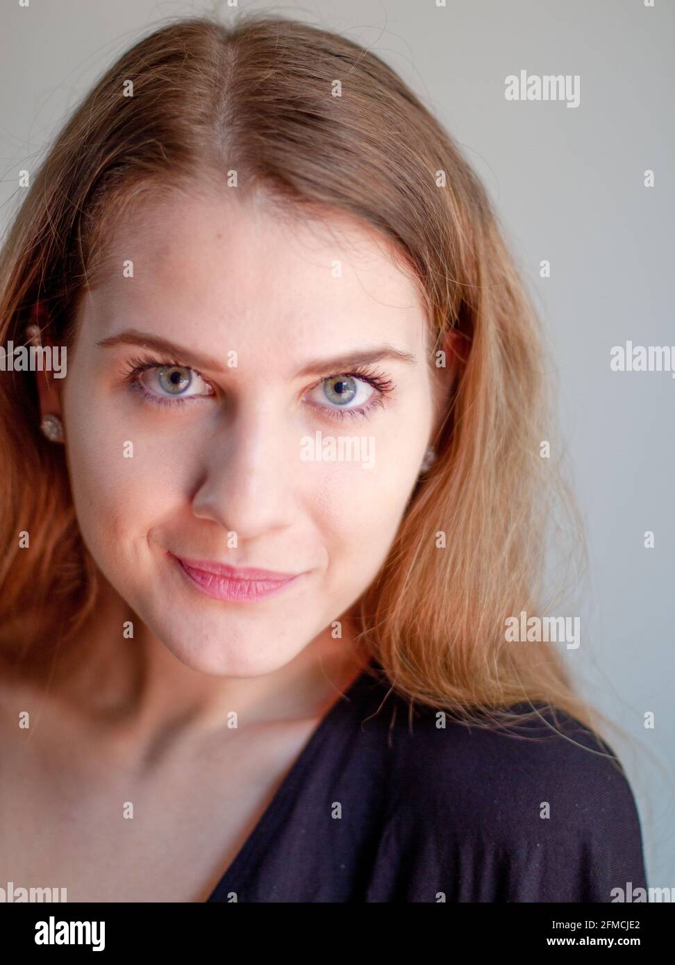 Portrait of a pretty slightly smiling Russian lady Stock Photo - Alamy
