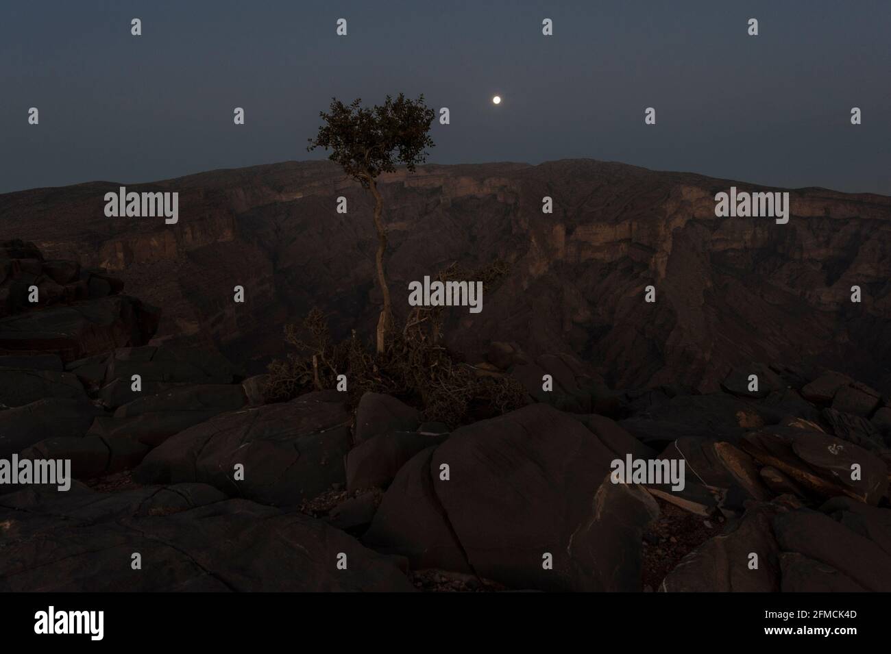 Full moon above Jebel Shams, the Grand Canyon of Arabia. Al Dakhiliyah ...