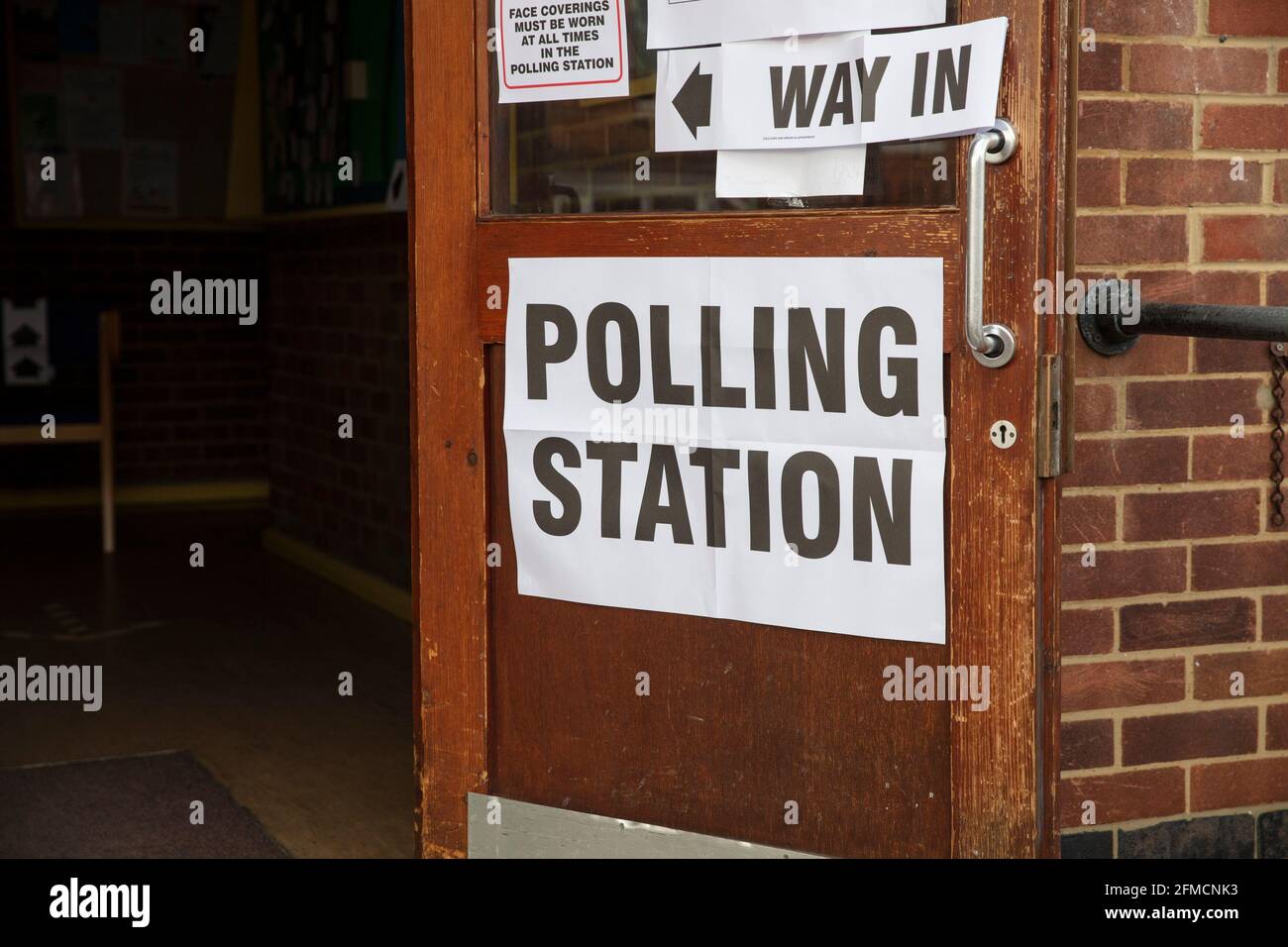 Polling station sign outside the entrance to a political voting ...