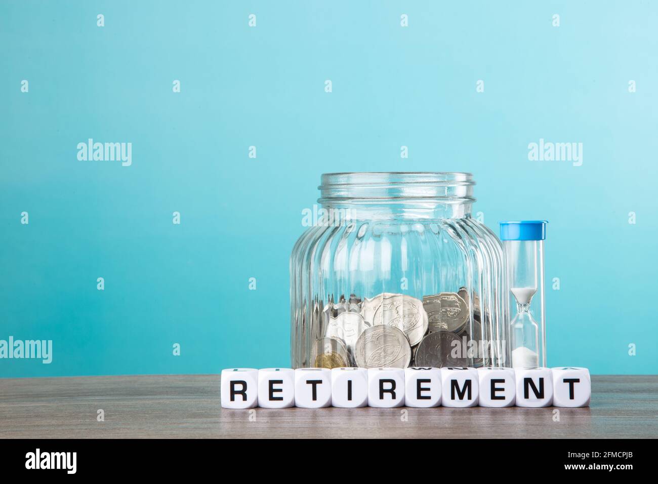 Saving money for retirement plan. Retirement Conceptual Stock Photo - Alamy