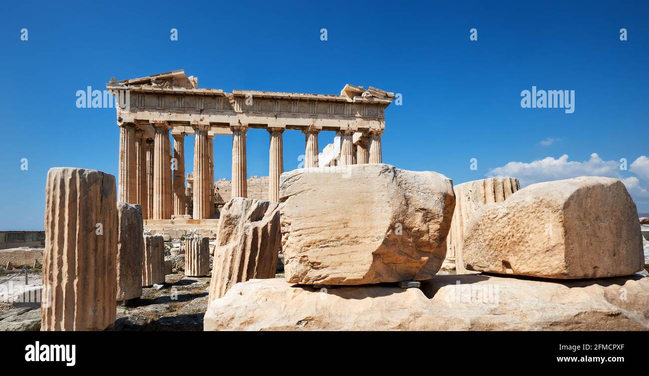 Parthenon temple on a bright day with blue sky and clouds. Panoramic ...