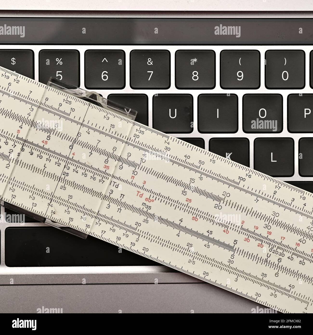 Slide rule and calculator hi-res stock photography and images - Alamy