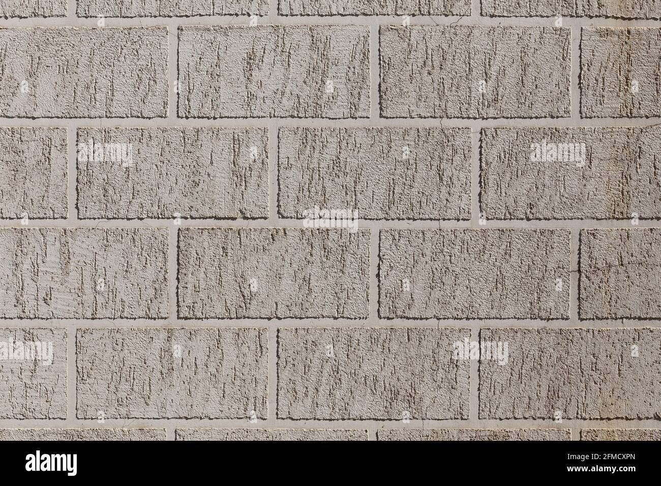 artificial brick-like pattern embossed in flat plaster surface Stock ...