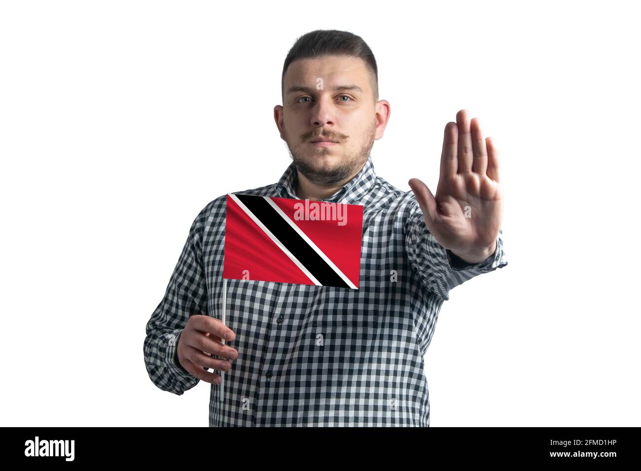 White guy holding a flag of Trinidad and Tobago and with a serious face ...
