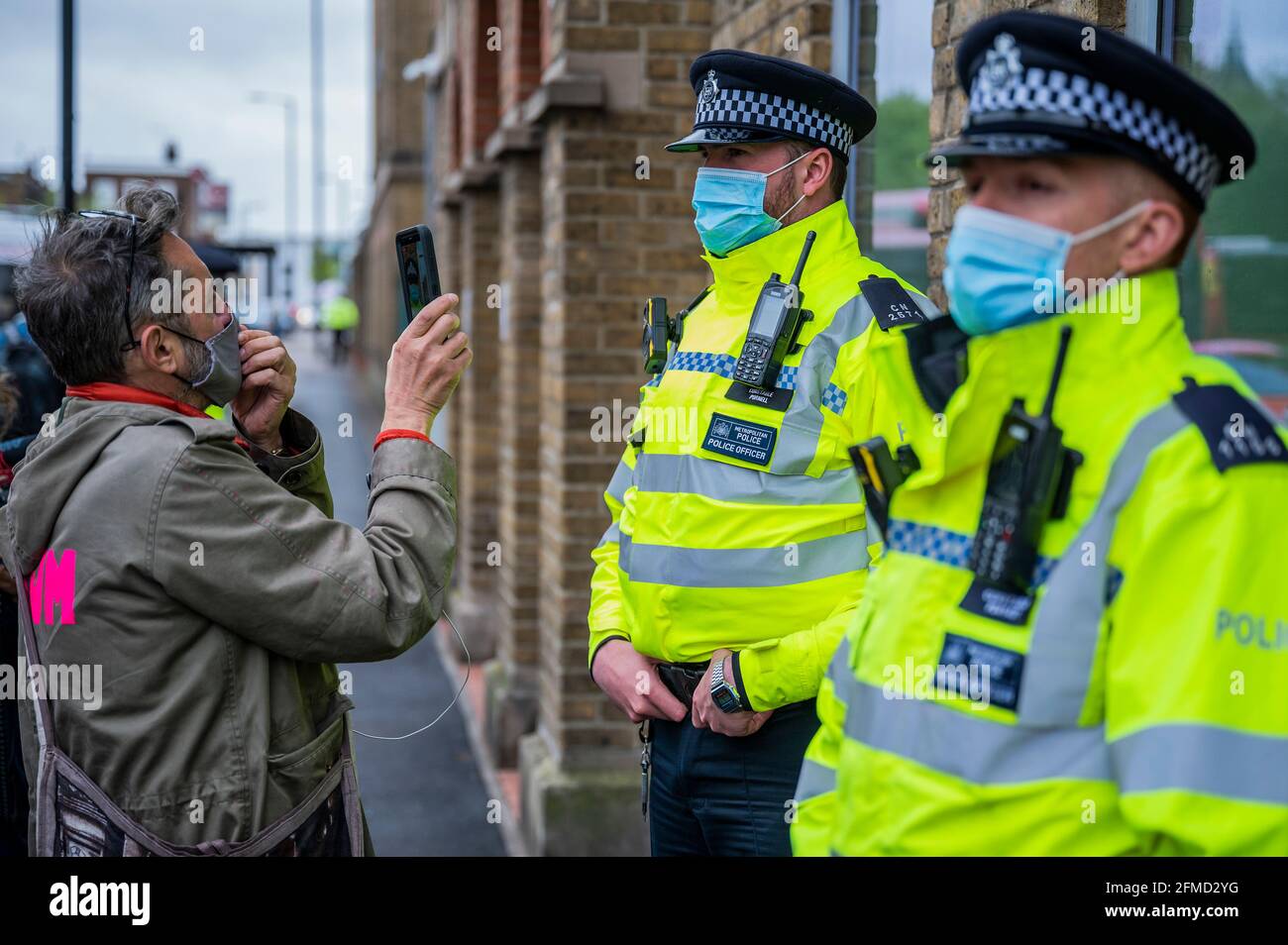 London, UK. 8th May, 2021. Pink Party supporters protest, outside ...