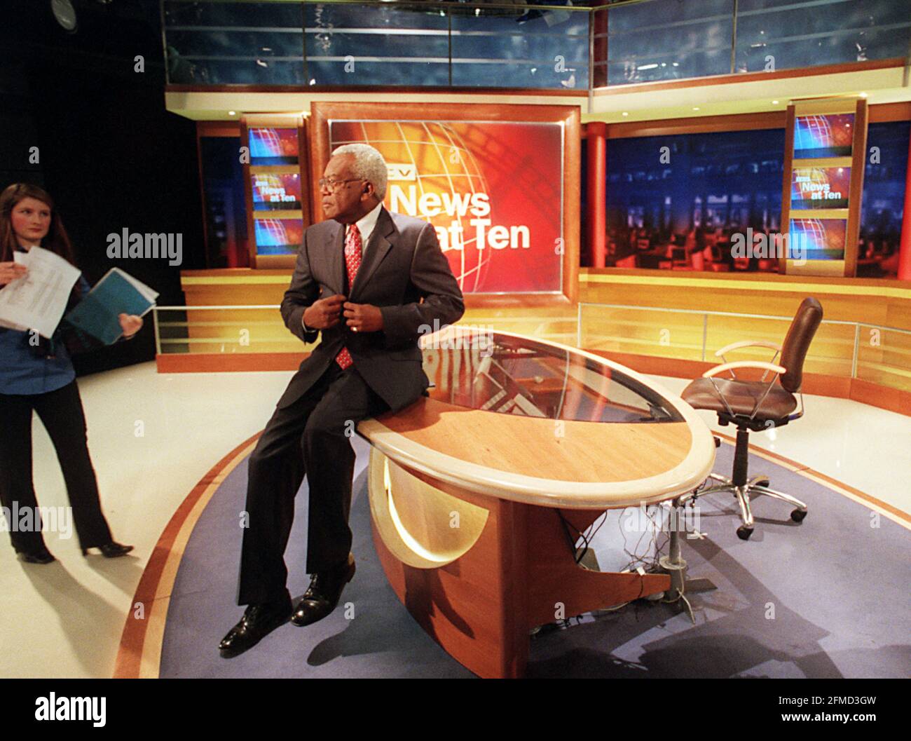 NEWSREADER TREVOR MCDONALD ON THE NEWS AT TEN SET. THE PROGRAMME IS TO ...