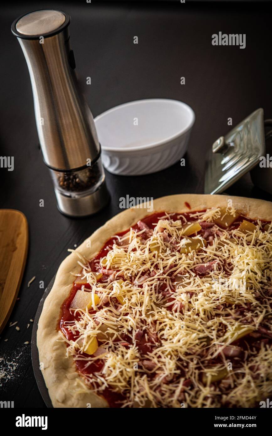 the preparation of a homemade pizza Stock Photo - Alamy