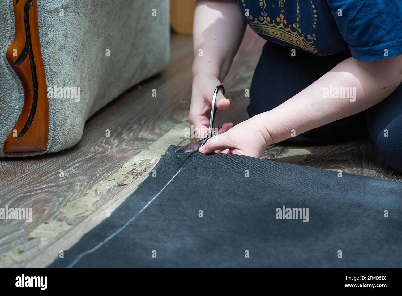 Hand dress making scissors cutting hi-res stock photography and images ...