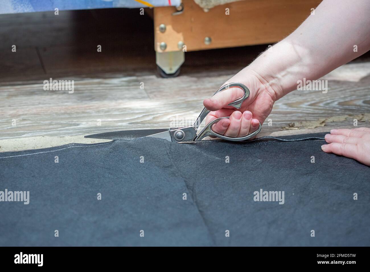 Hand dress making scissors cutting hi-res stock photography and images ...