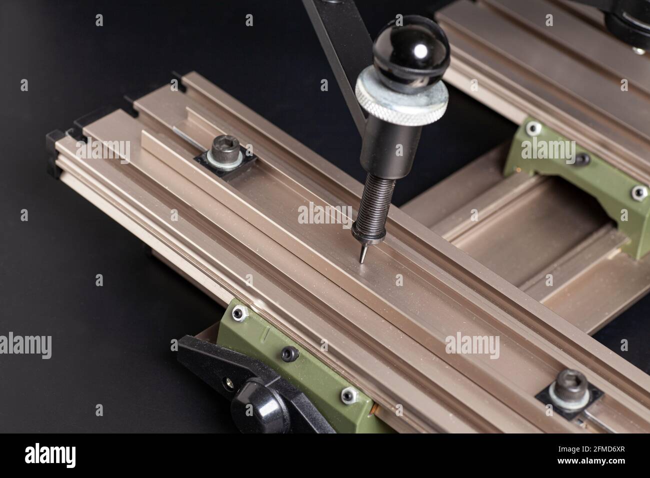 Engraving device pantograph on black background Stock Photo - Alamy