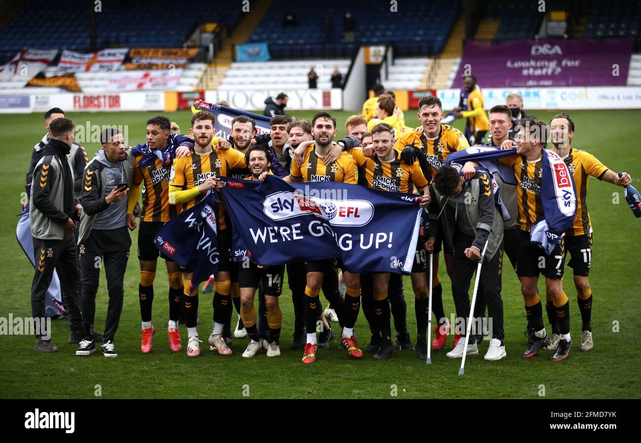 Cambridge United players celebrate on the pitch after the Sky Bet ...
