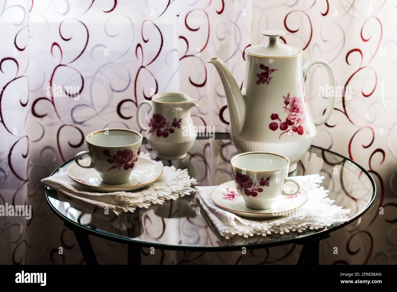 White teapot on table hi-res stock photography and images - Alamy