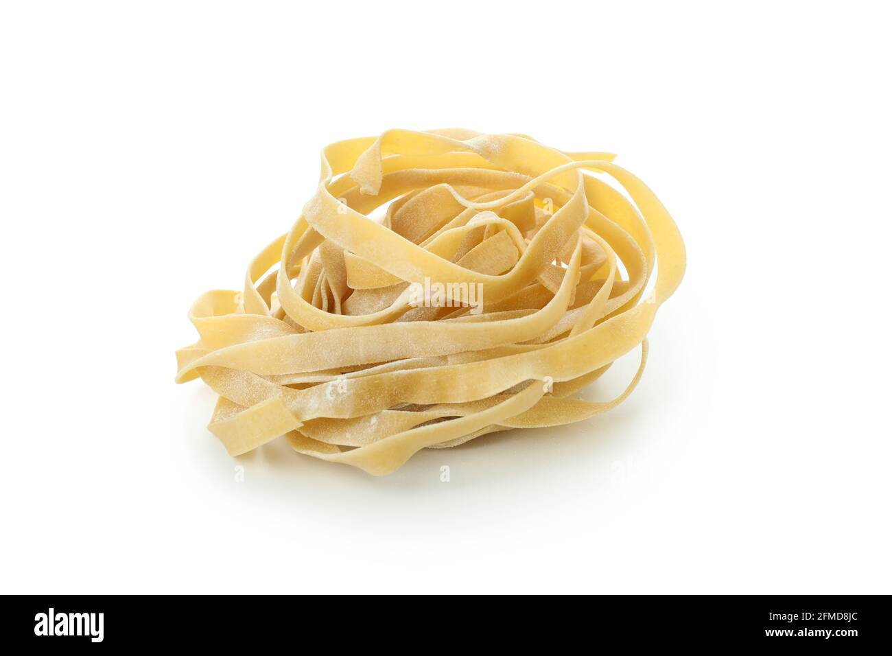 Uncooked raw pasta isolated on white background Stock Photo - Alamy