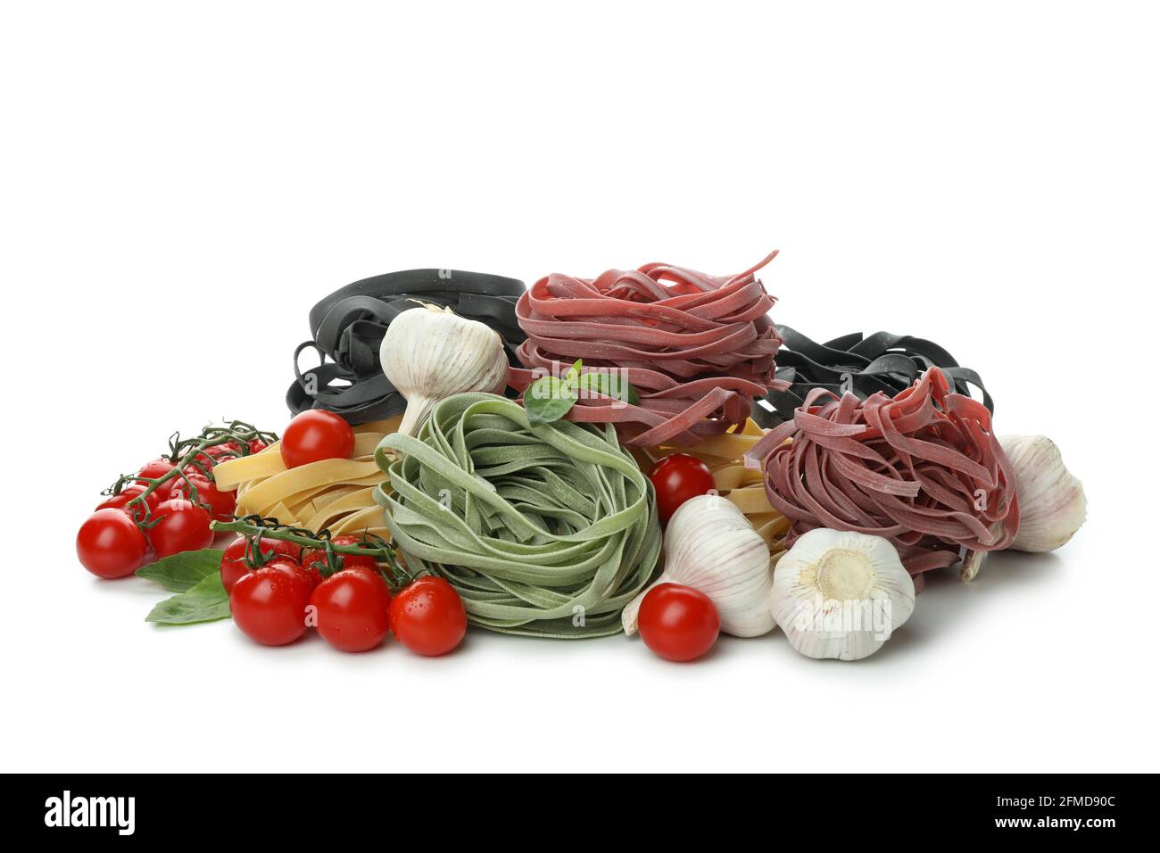 Uncooked color pasta isolated on white background Stock Photo - Alamy
