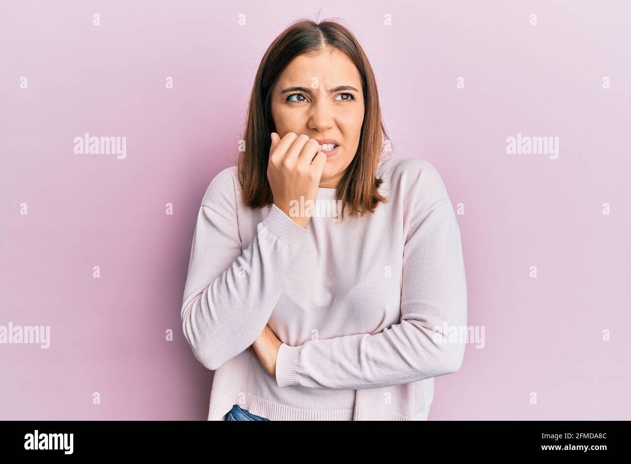 Young beautiful woman wearing casual clothes looking stressed and ...