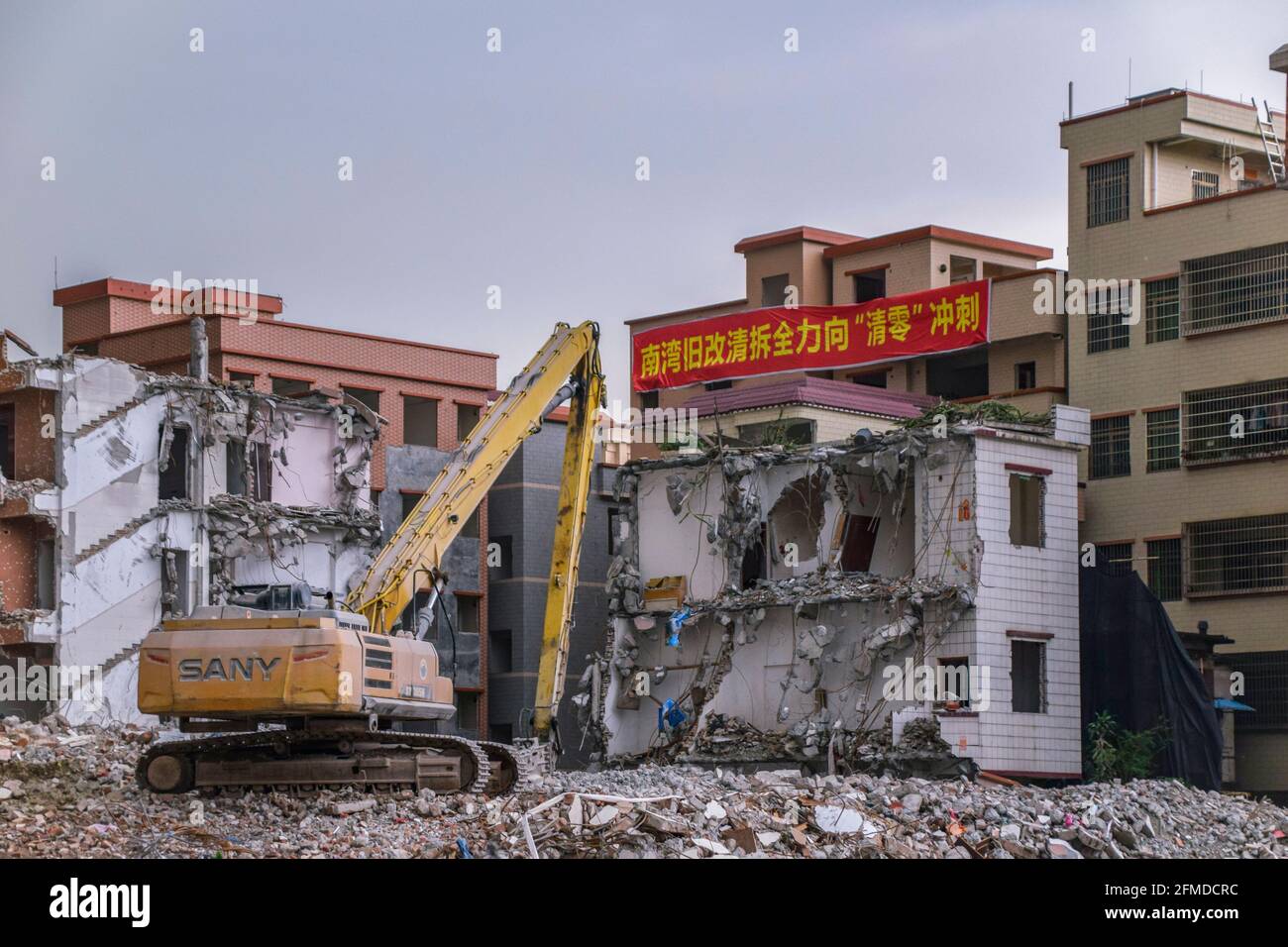 Guangzhou,China. MAY 1, 2021. Buildings under demolition, partly pulled ...