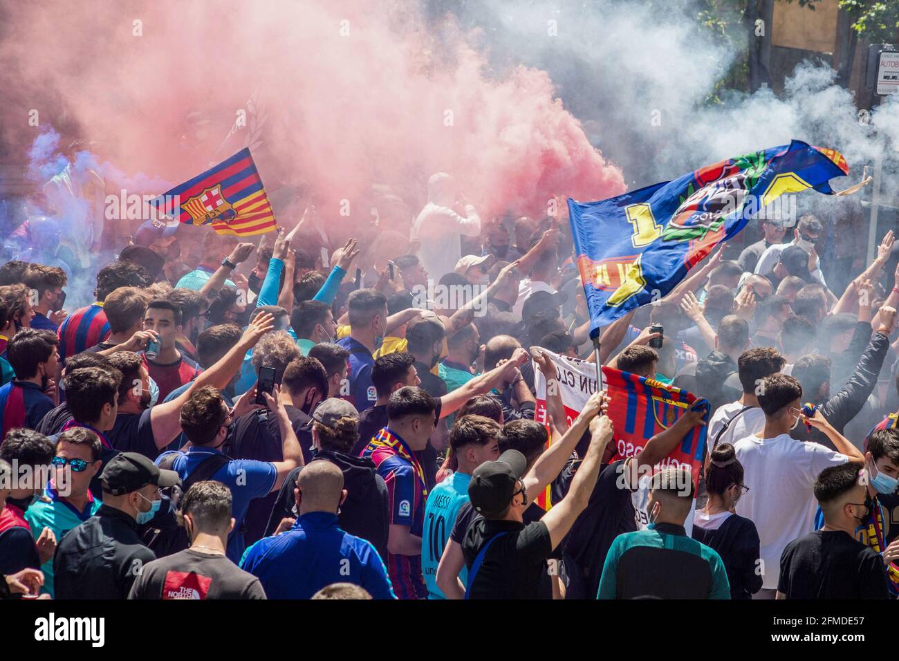 Football Club Barcelona fans hold flags and burning flares. The ultras ...
