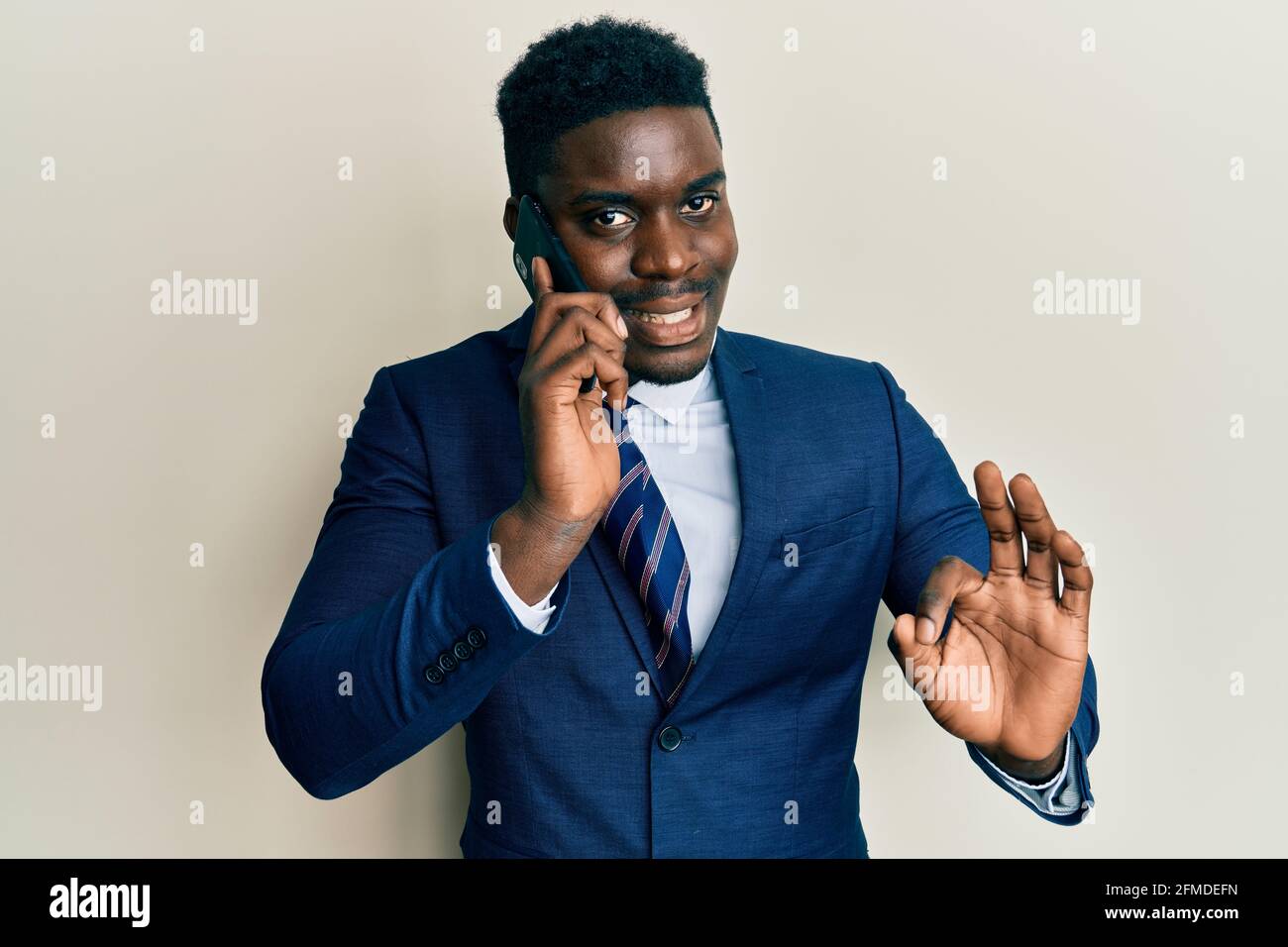 Handsome business black man having conversation talking on the ...