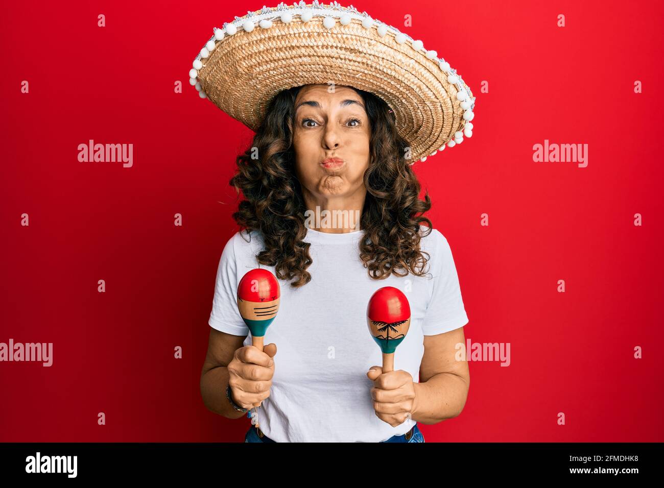 Old woman playing maracas hi-res stock photography and images - Alamy
