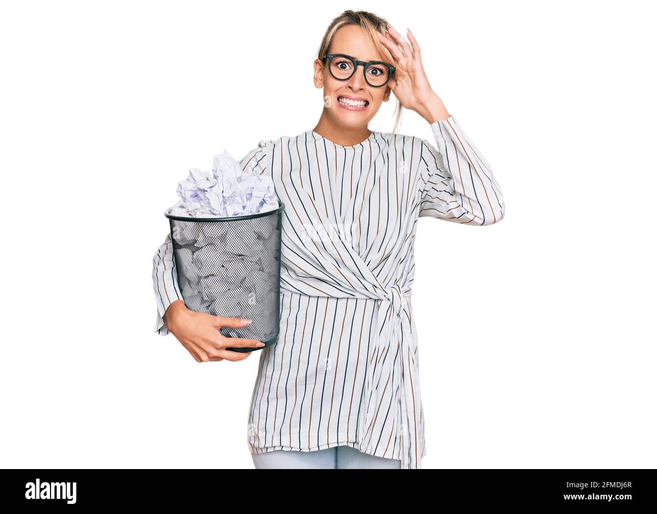 Woman holding papers shocked hi-res stock photography and images - Alamy
