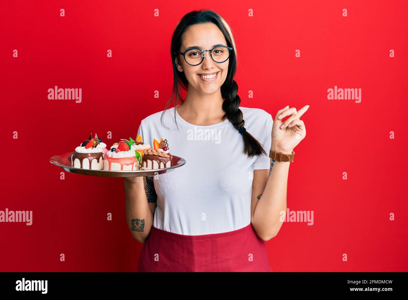 One woman tray cakes hi-res stock photography and images - Alamy