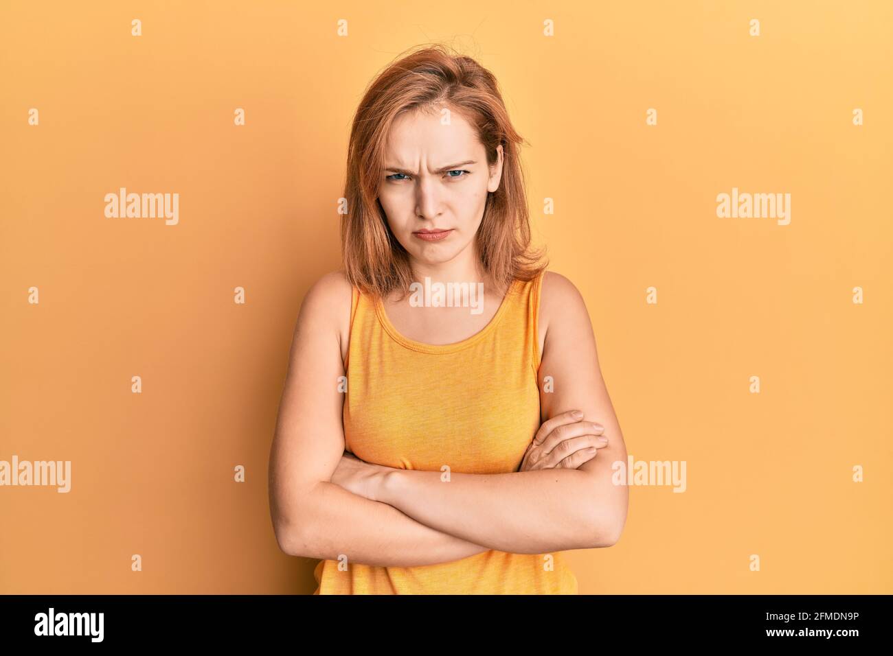 Young caucasian woman wearing casual style with sleeveless shirt ...