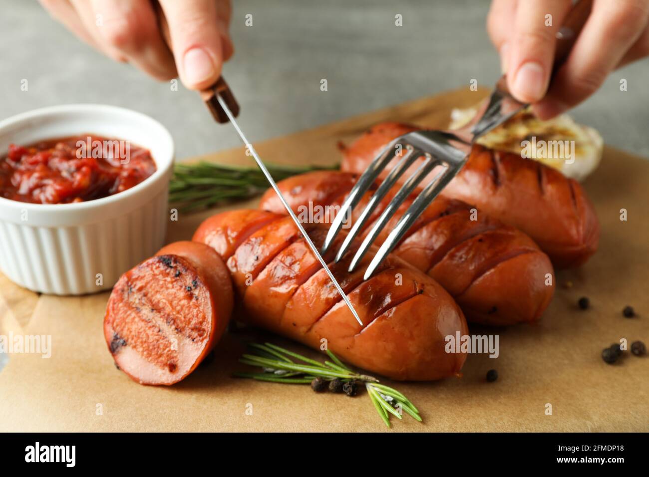 Grilled sausage woman hi-res stock photography and images - Alamy