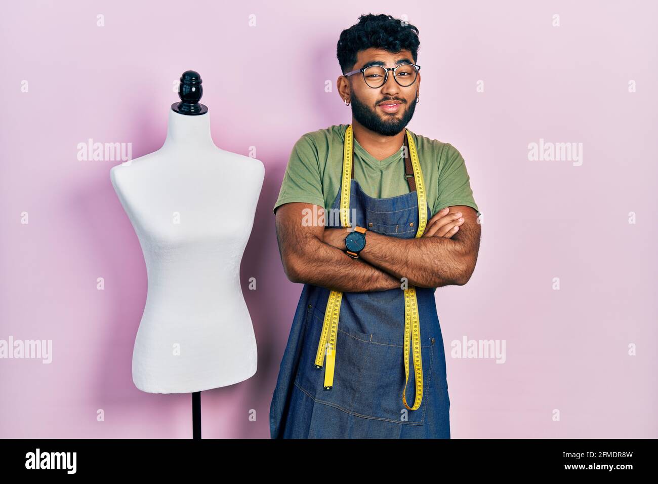 Arab man with beard dressmaker designer wearing atelier apron ...