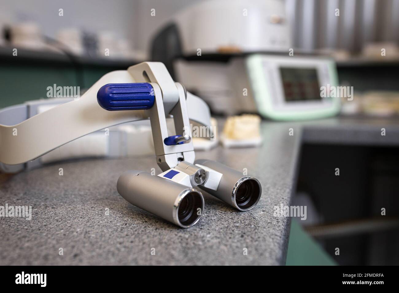 Professional dentist glasses with magnification in a dental clinic ...