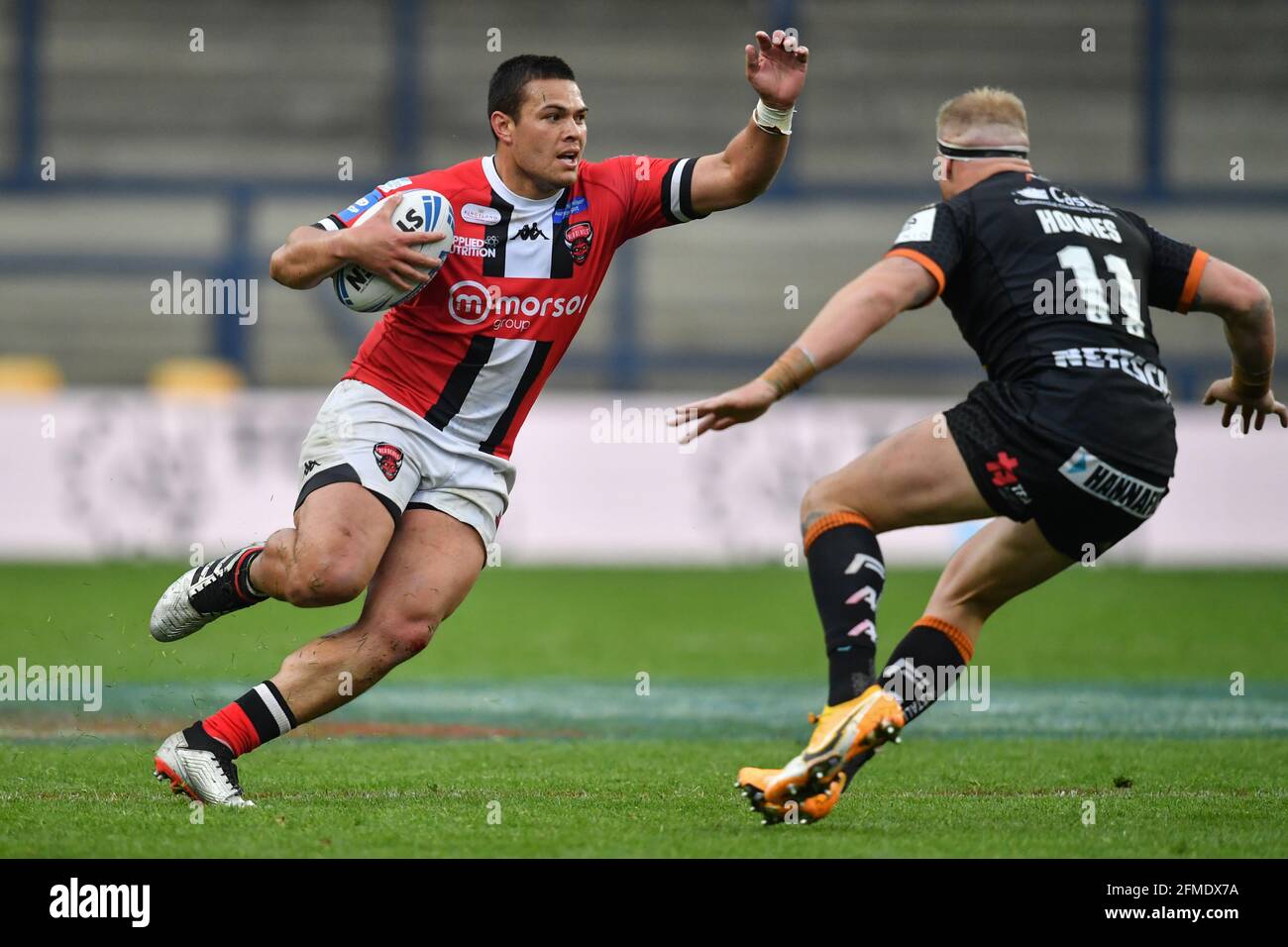 Tui Lolohea (6) of Salford Red Devils in action during the game Stock ...