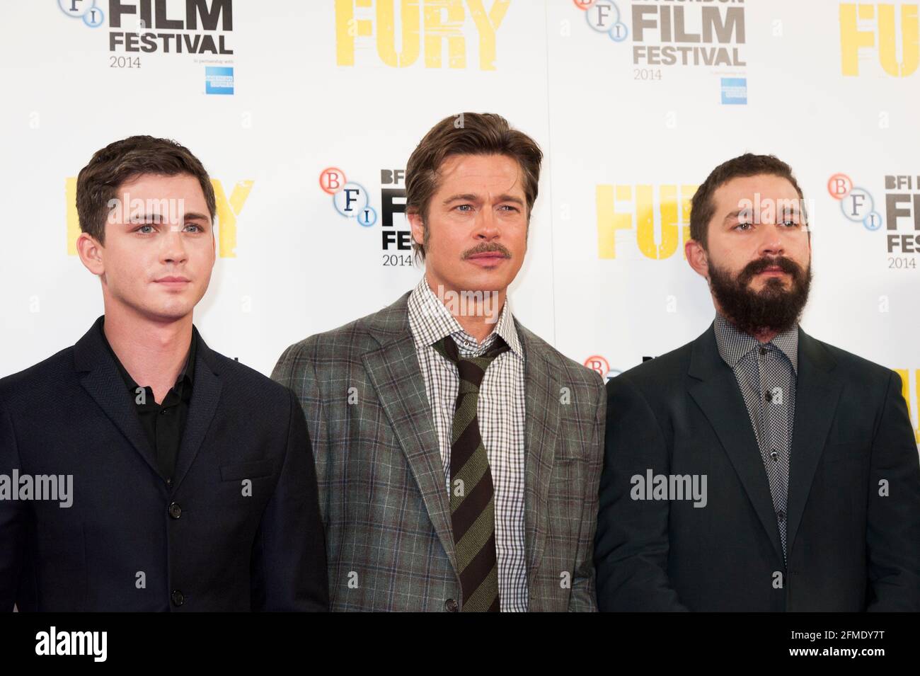 Logan Lerman, Brad Pitt and Shia LaBeouf attend the Fury photocall at ...